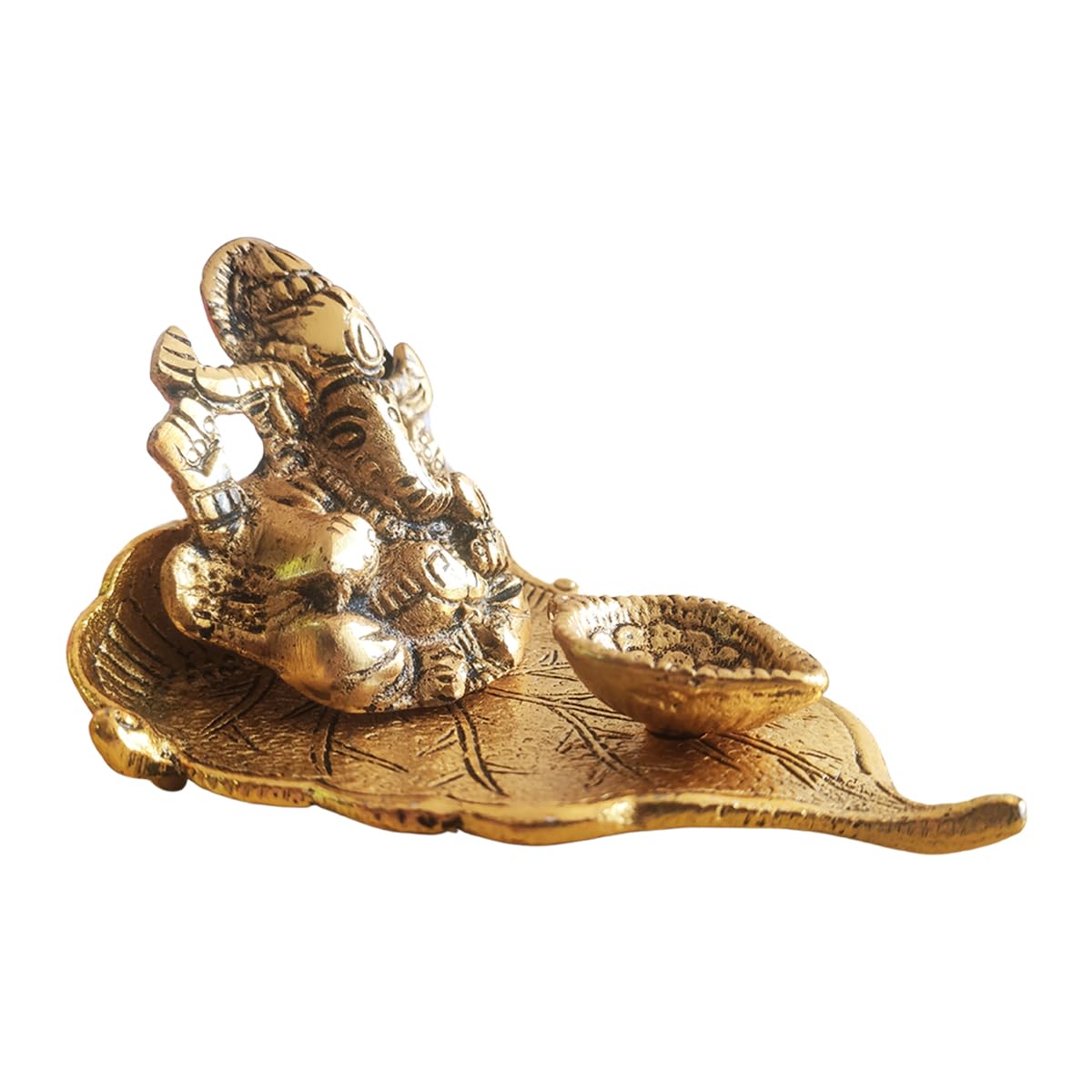 Saugat Traders Lord Ganesha On Leaf With Diya For Pooja | Brass Ganesh ...